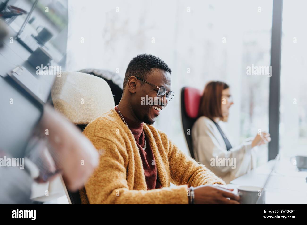 Mixed race team collaborating and analyzing business statistics Stock ...