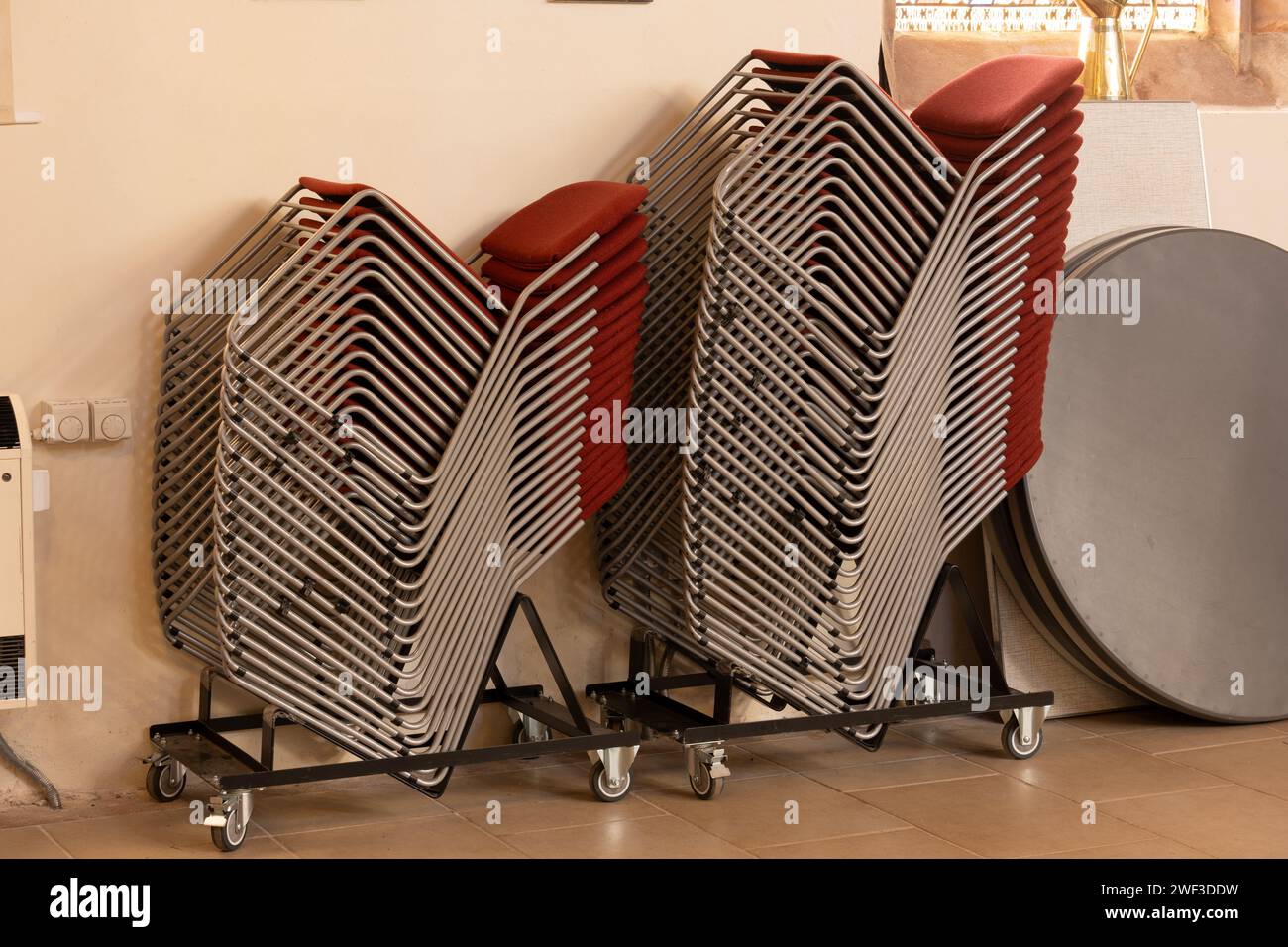 Stacking chairs in St. Margaret`s Church, Wolston, Warwickshire ...