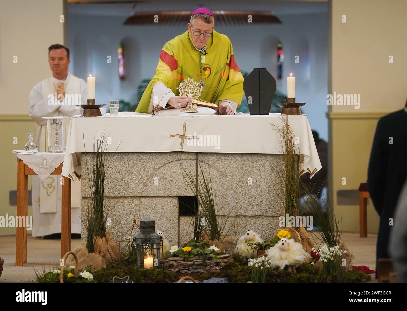 Bishop Denis Nulty, Bishop of Kildare & Leighlin, places the relic of ...