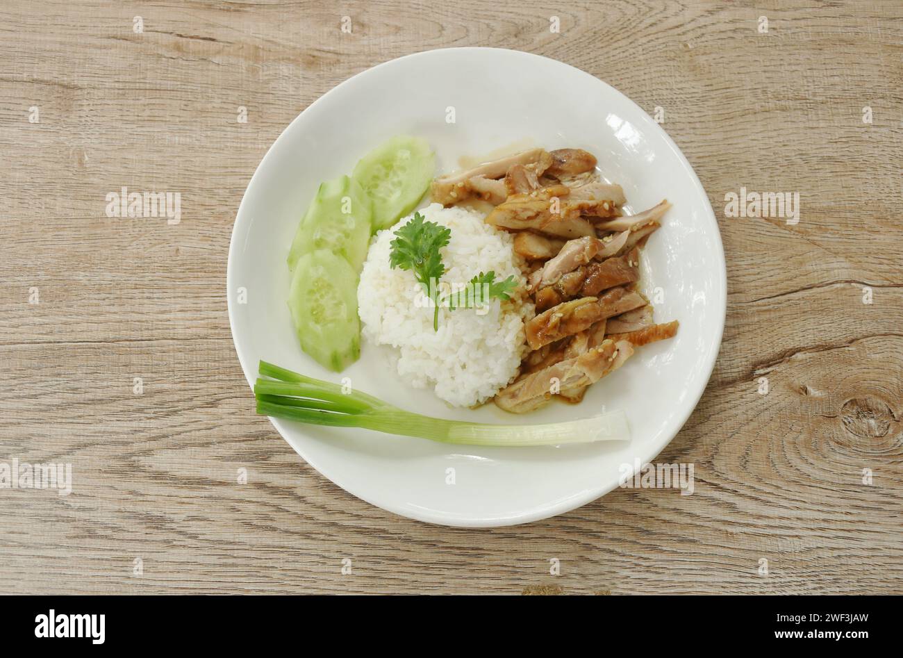 slice grilled chicken topping white sesame with Teriyaki Japanese sauce ...