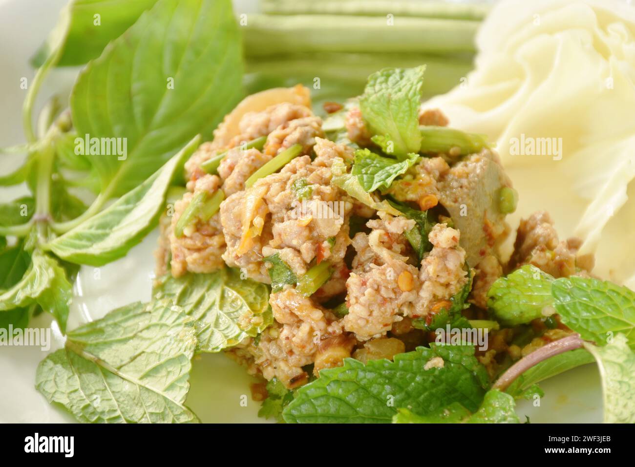 Thai spicy chop pork and slice skin with liver salad on plate Stock ...