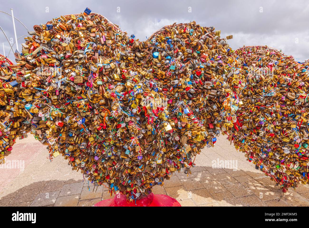 Heart-shaped symbols adorned with padlocks tell tales of enduring love ...