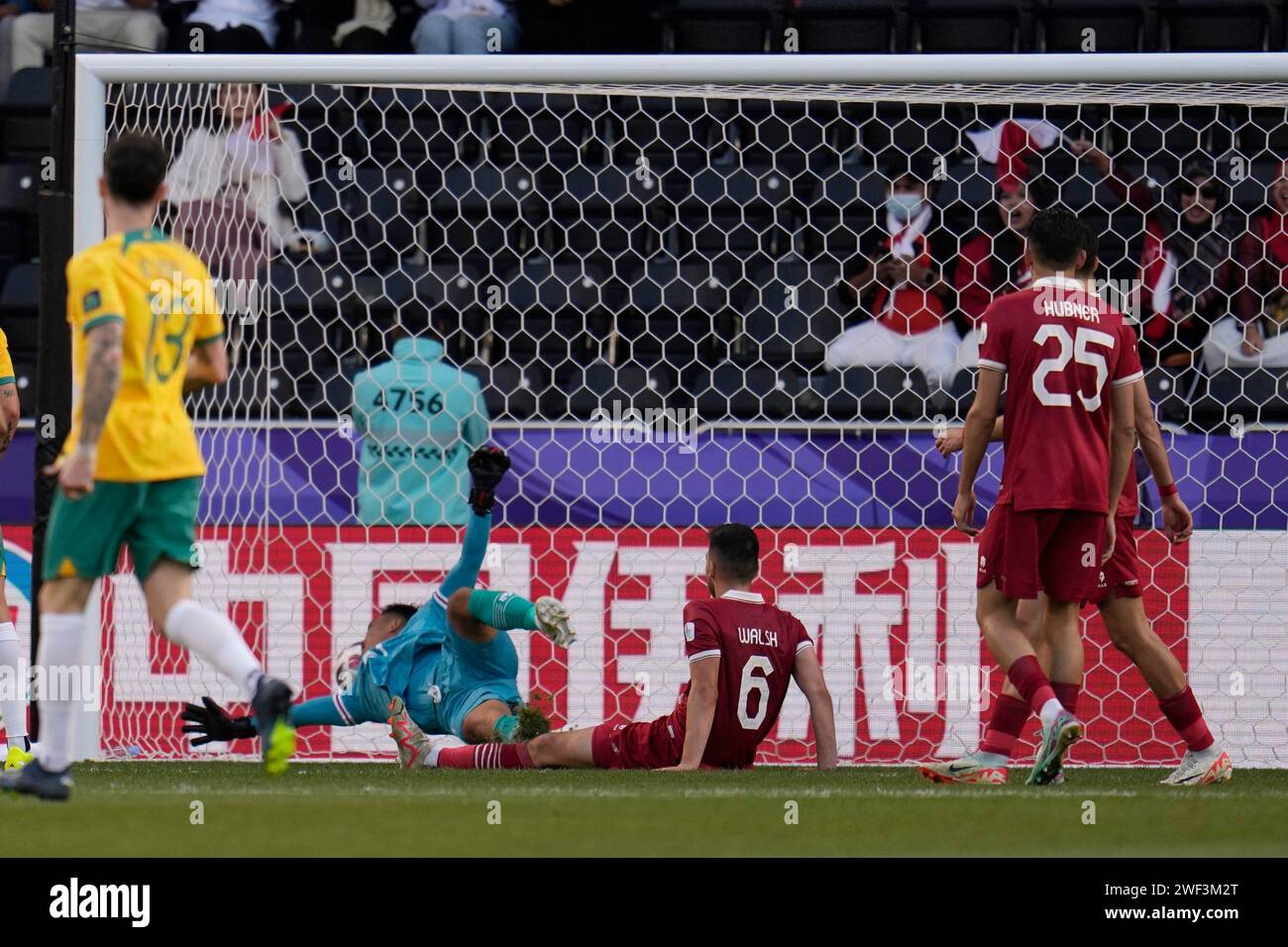 Indonesia's goalkeeper Ernando Ari Sutaryadi receives the third goal ...