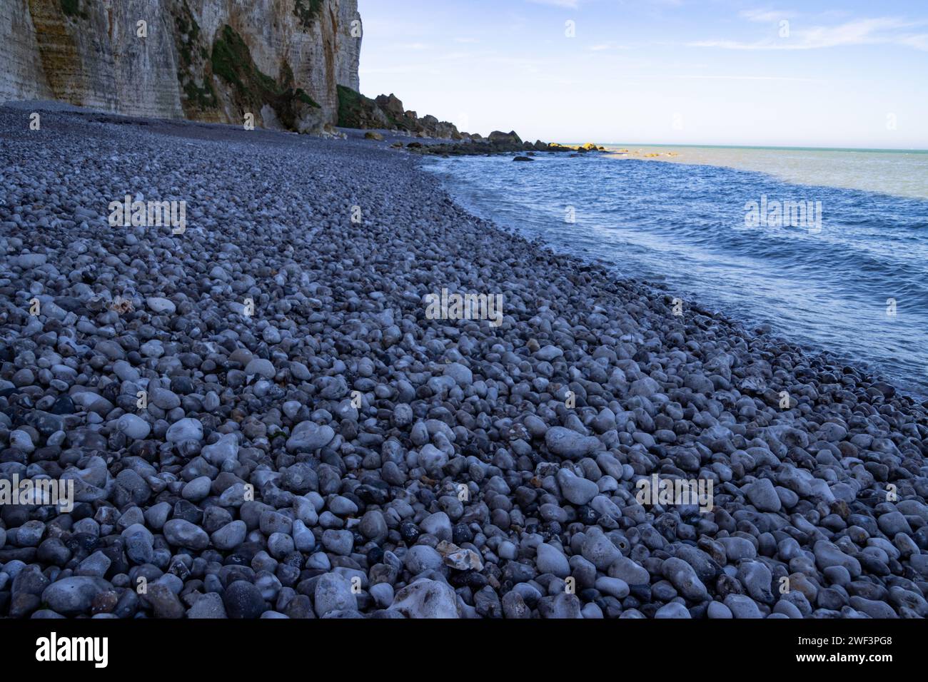 Low angle view of round pebbles on the beach in normandy, france Stock ...