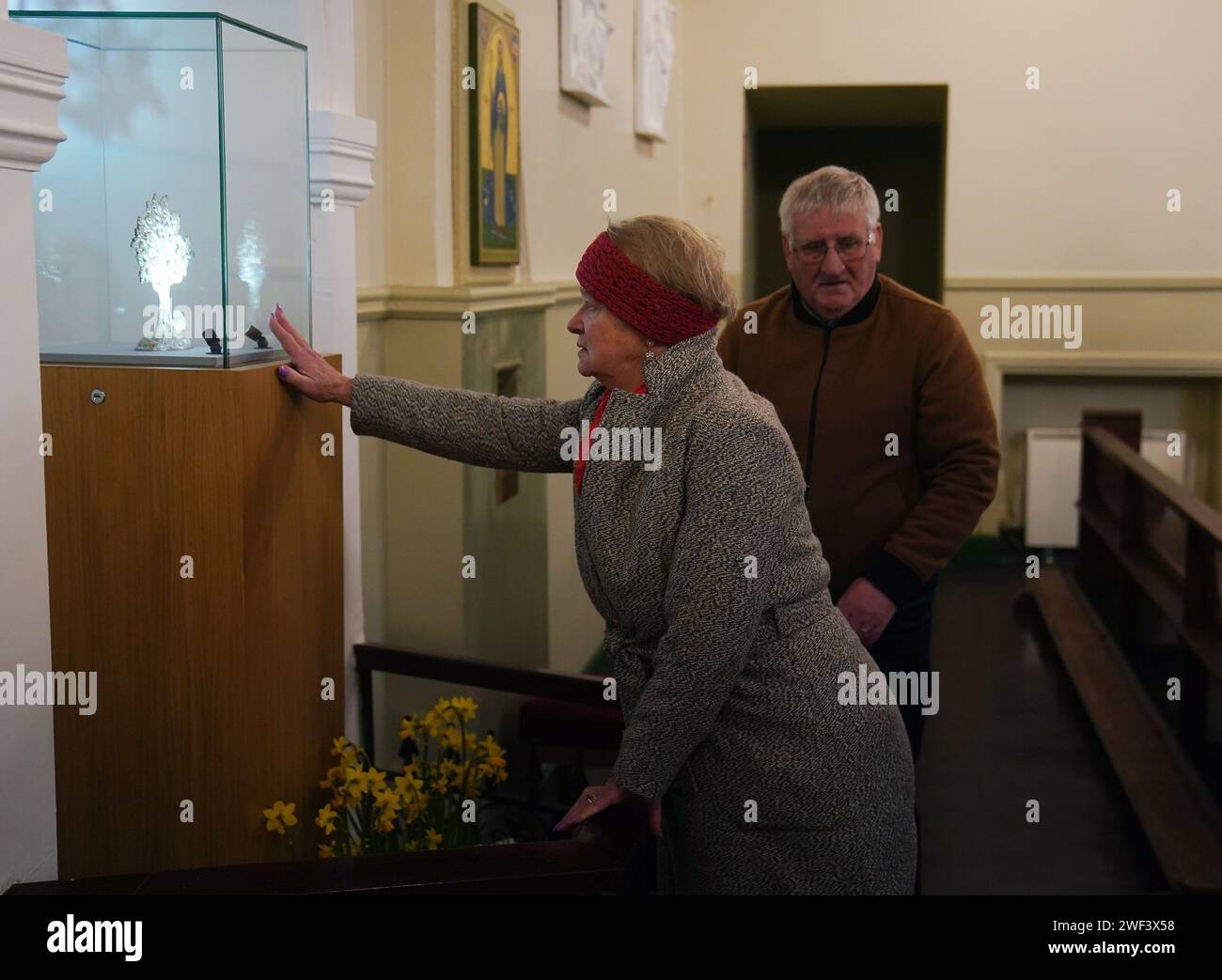 People queue to view a relic of St. Brigid on display in St. Brigid's ...