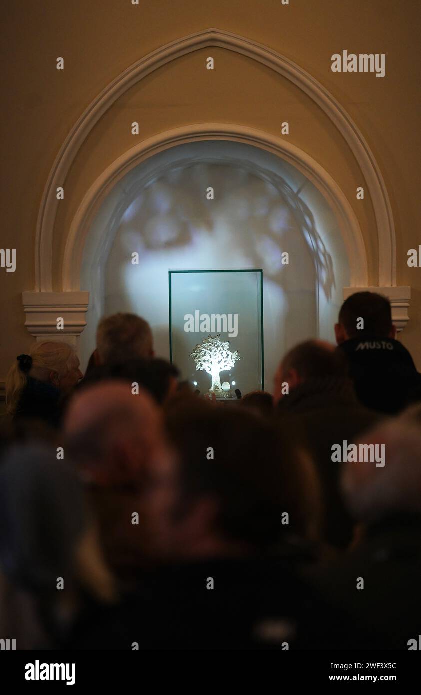 People queue to view a relic of St. Brigid on display in St. Brigid's ...