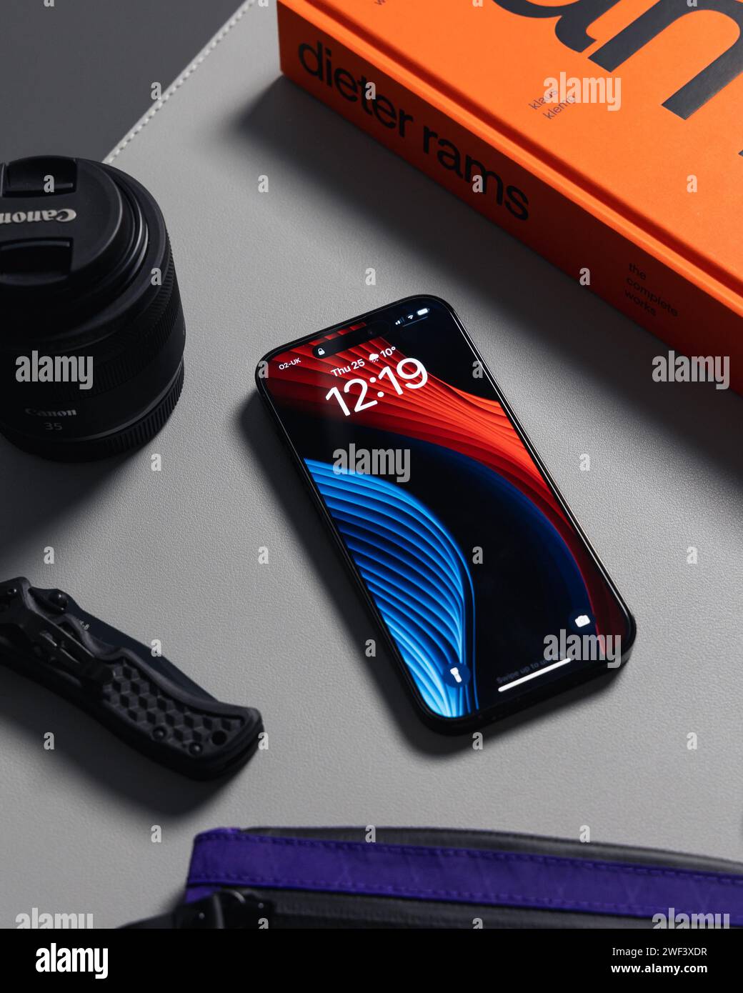 LONDON - JANUARY 25, 2024: Apple iPhone Pro with wallpaper on screen ...