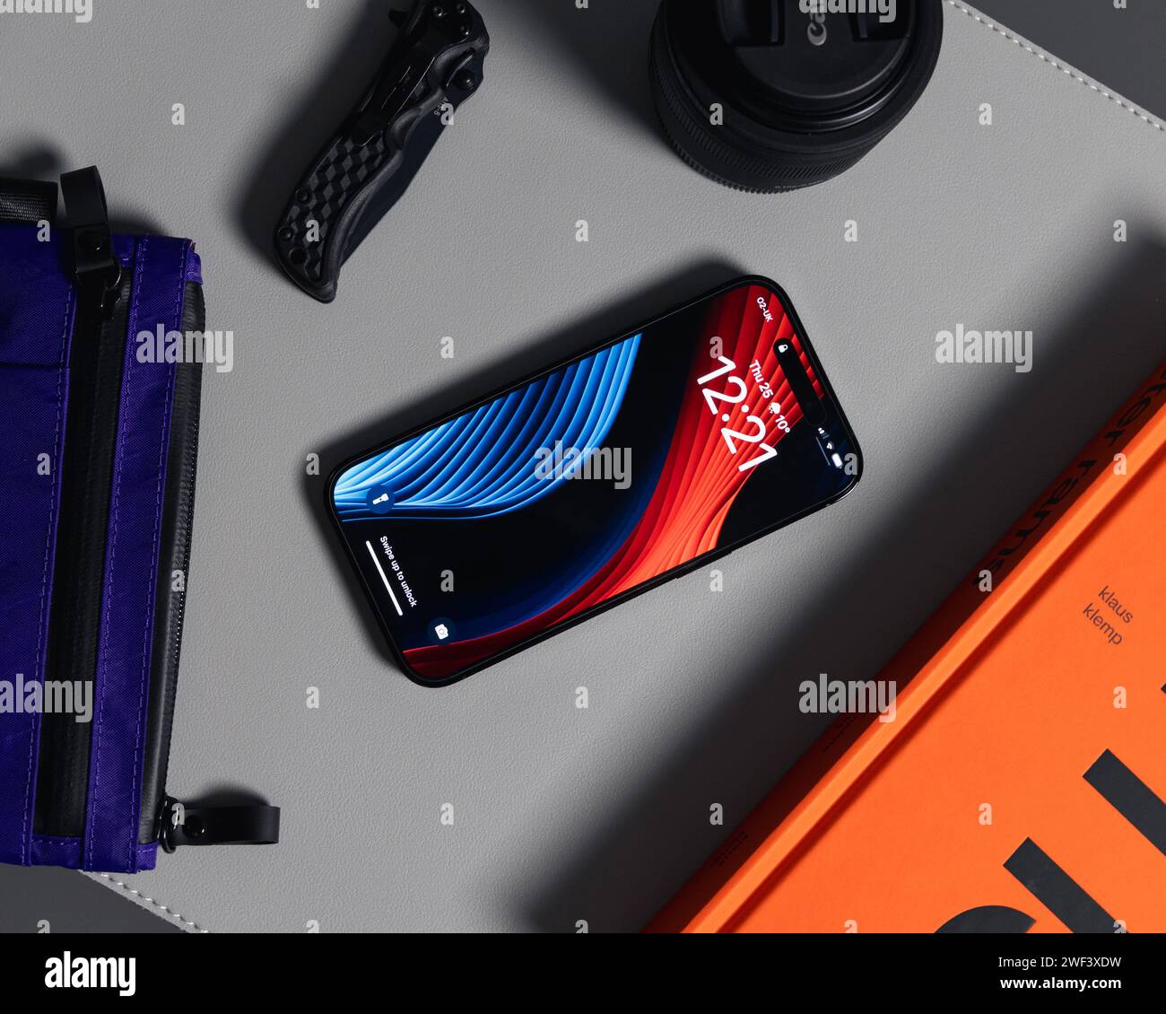 LONDON - JANUARY 25, 2024: Apple iPhone Pro with wallpaper on screen ...