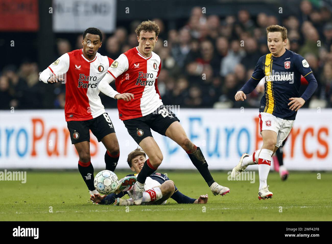 ROTTERDAM - (l-r) Quinten Timber of Feyenoord, Mats Wieffer of Feyenoord, Daan Rots of FC Twente ...