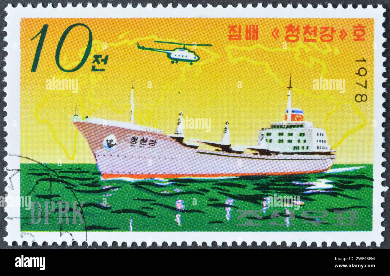 Cancelled postage stamp printed by North Korea, that shows Freighter ...