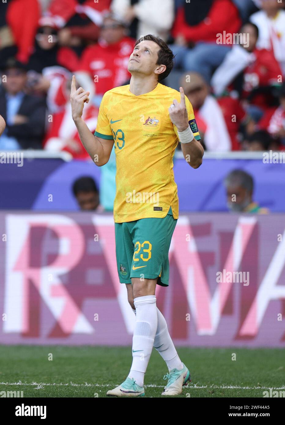 Doha, Qatar. 28th Jan, 2024. Craig Goodwin of Australia celebrates ...
