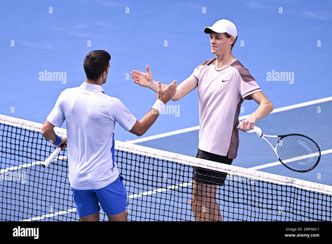 Jannik Sinner of Italy wins over Novak Djokovic of Serbia during the ...