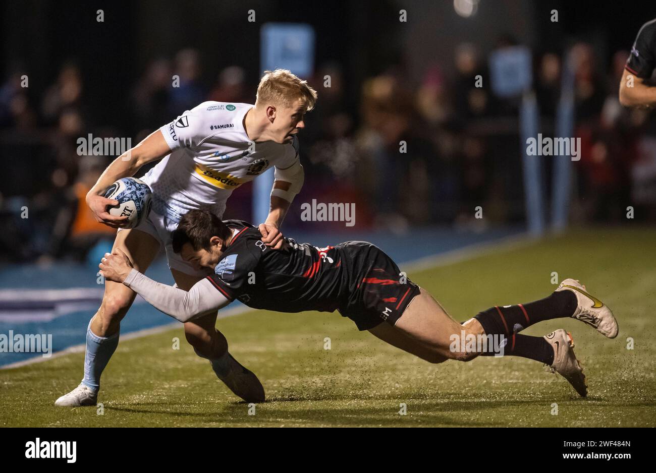 Exeter Chiefs Josh Hodge and Saracens Alex Goode in action during the ...