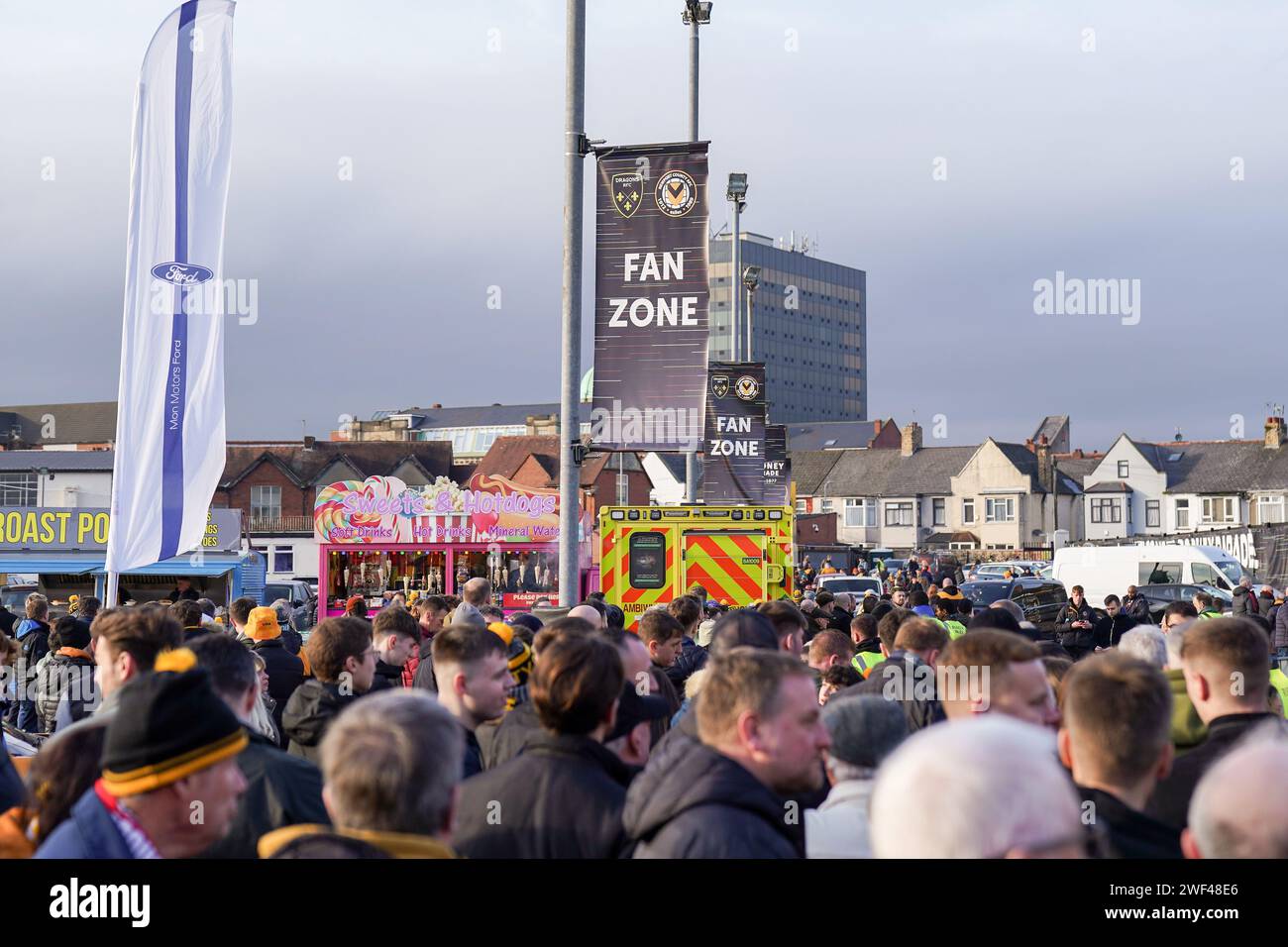 Supporters await the arrival of the Manchester United Team Coach in the ...