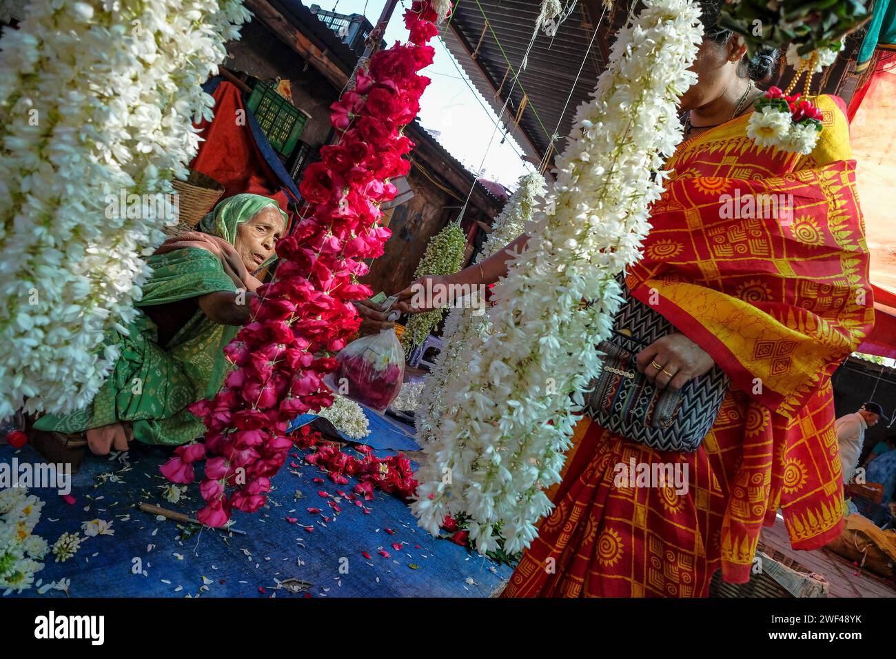 Vadodara, India - January 14, 2024: Flower sellers at the Khanderao ...