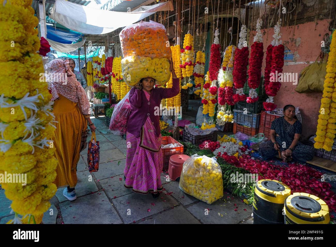 Vadodara, India - January 14, 2024: Flower sellers at the Khanderao ...