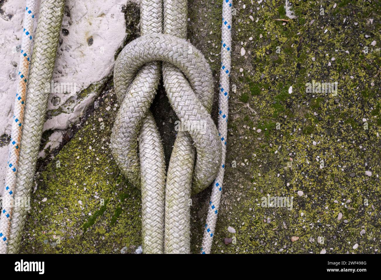 The Reef Knot or Square Knot. Rope knot of a large fishing vessel in ...