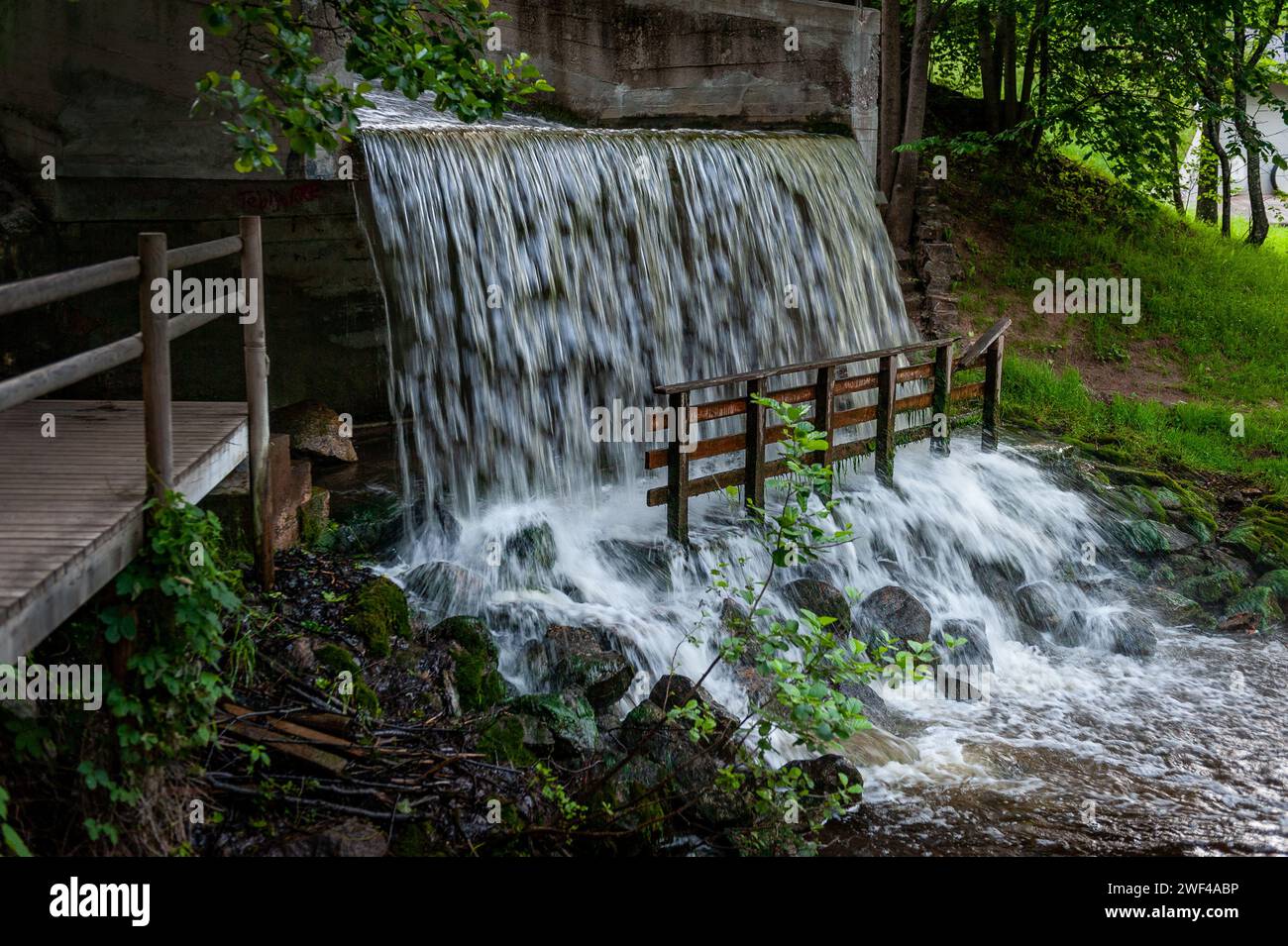 Artificial waterfall in public park. Vecais parks, Smiltene, Latvia ...