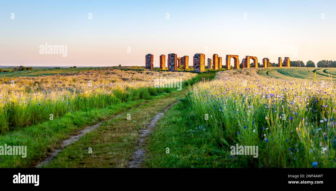 Ruins of an ancient building that looks like Stonehenge at sunrise ...