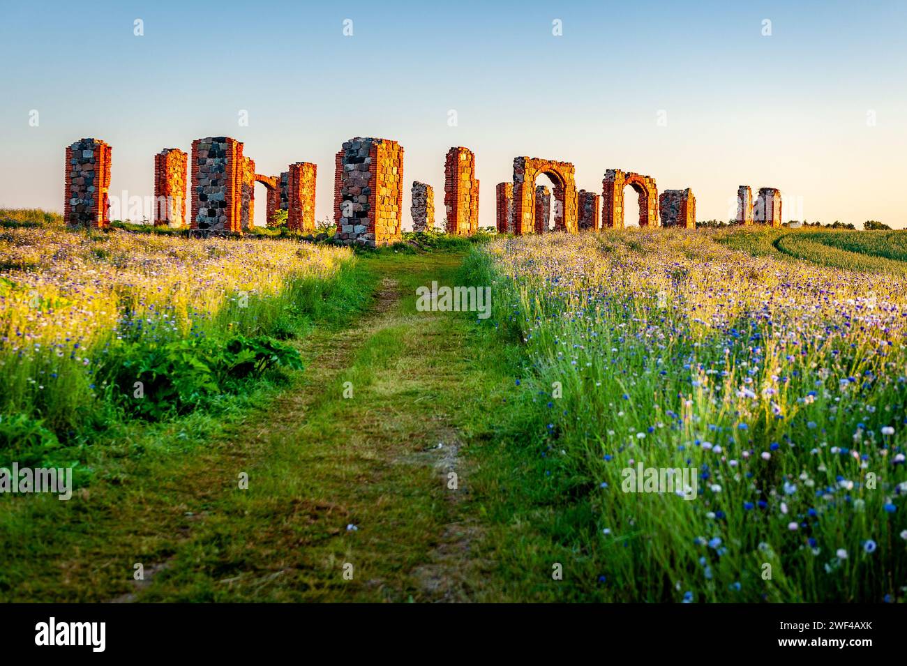 Ruins of an ancient building that looks like Stonehenge at sunrise ...