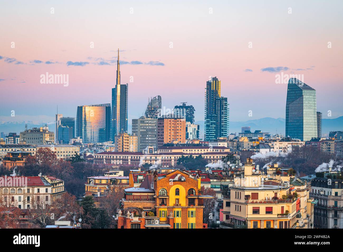 Milan, Italy financial district skyline over residential apartments at ...