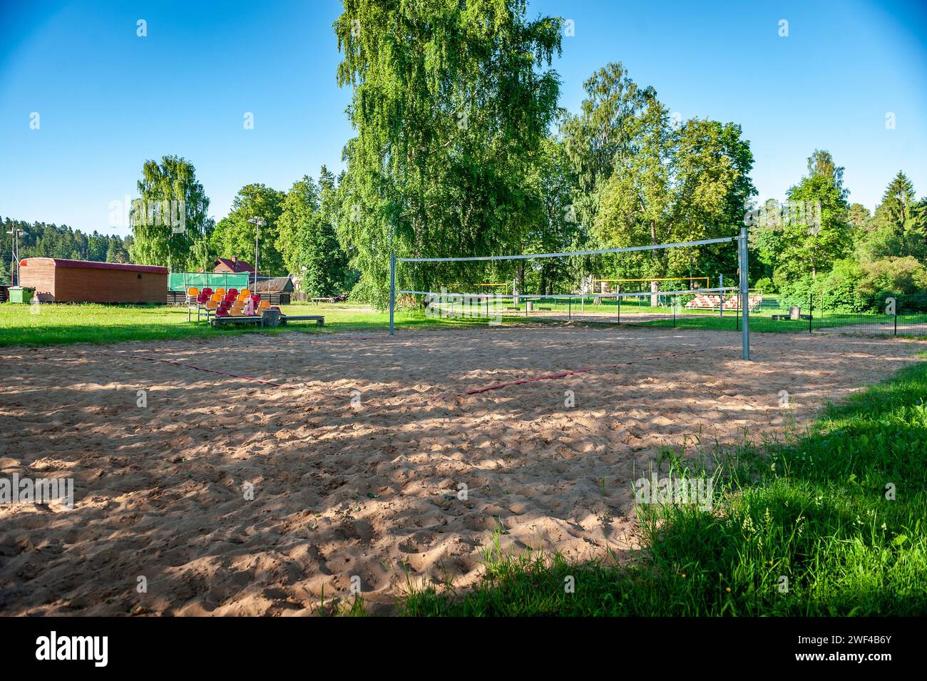 Outdoor volleyball court with sands in a beautiful day. Public ...