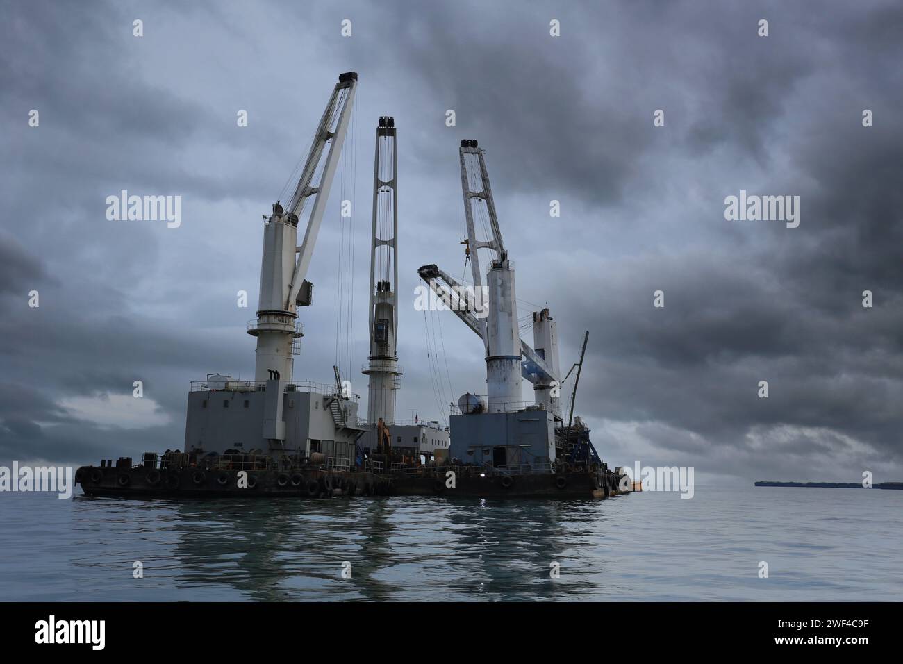 Marine cranes are used for loading and unloading cargo onto ships, The ...