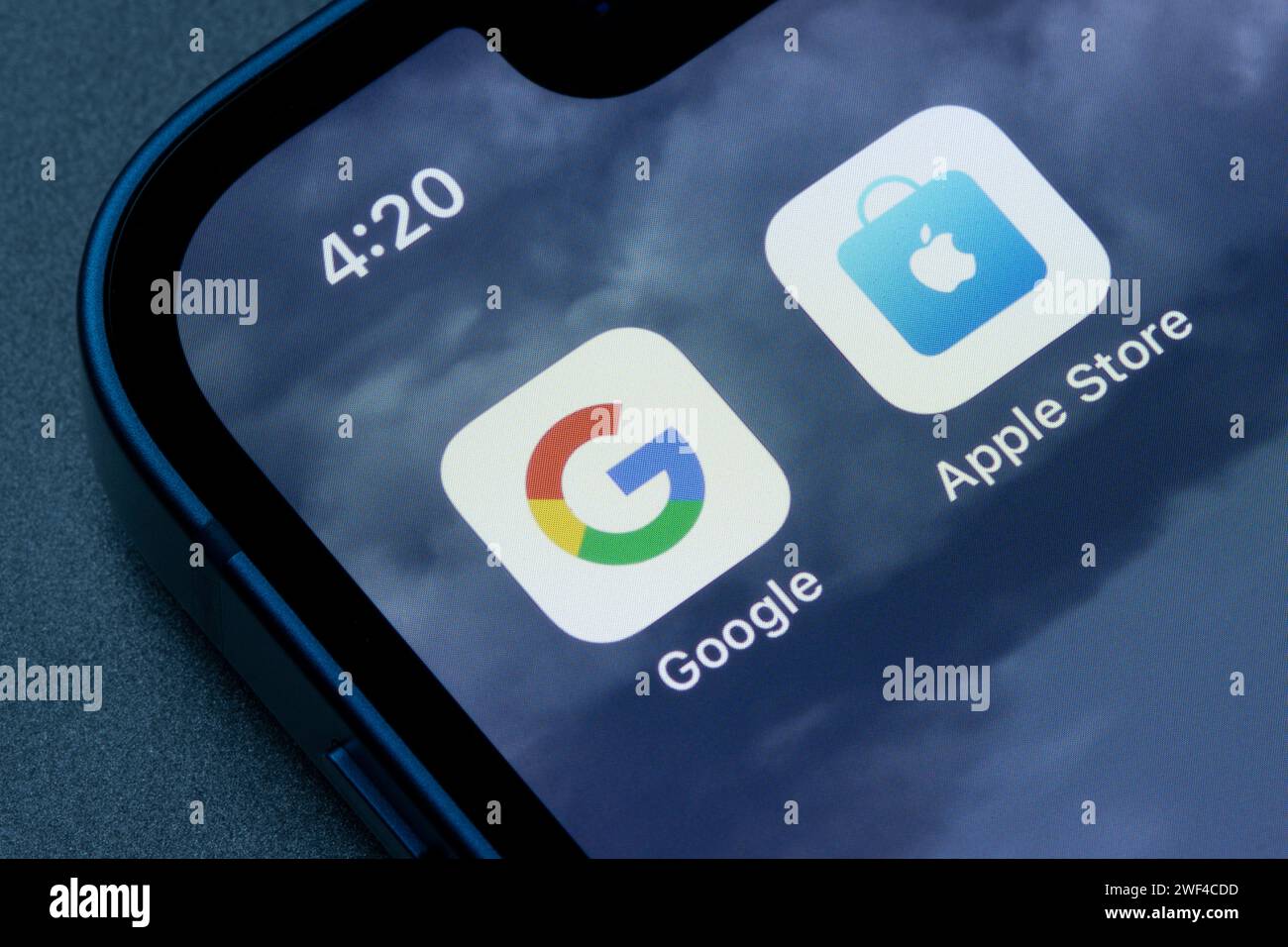 Google and Apple Store app icons are seen on an iPhone. Big tech and ...