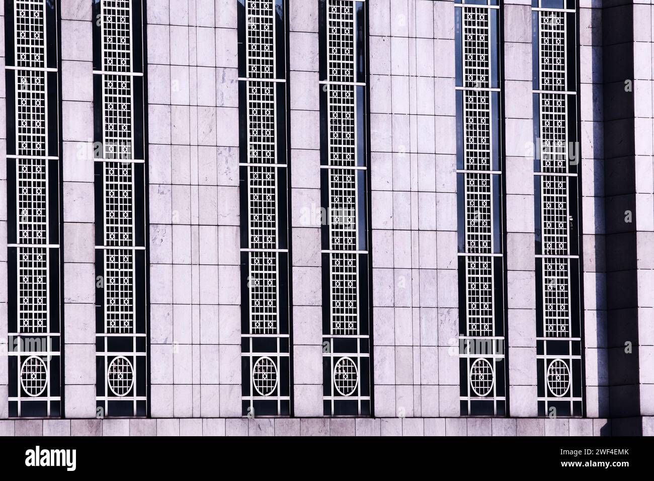 Tall building background, Side of the building with windows and door ...