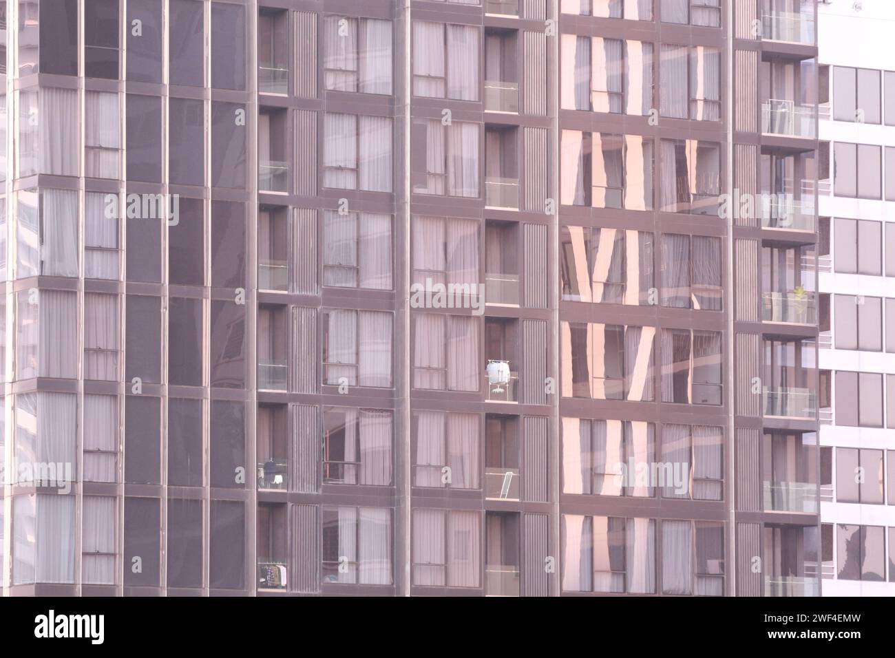 Tall building background, Side of the building with windows and door ...