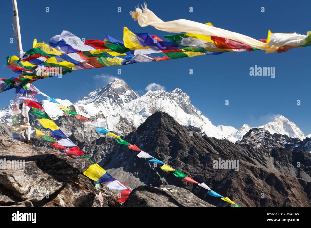 view of Mount Everest, Mt Lhotse and Makalu peak with buddhist prayer ...