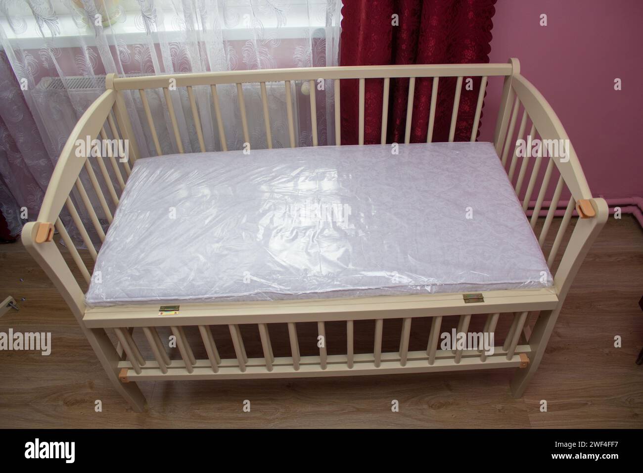 Empty crib hi-res stock photography and images - Alamy