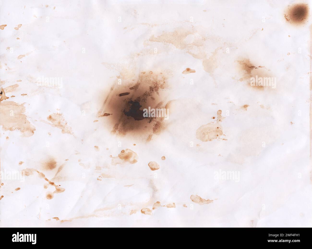 Vintage colored of old paper background with thermal burn marks for ...