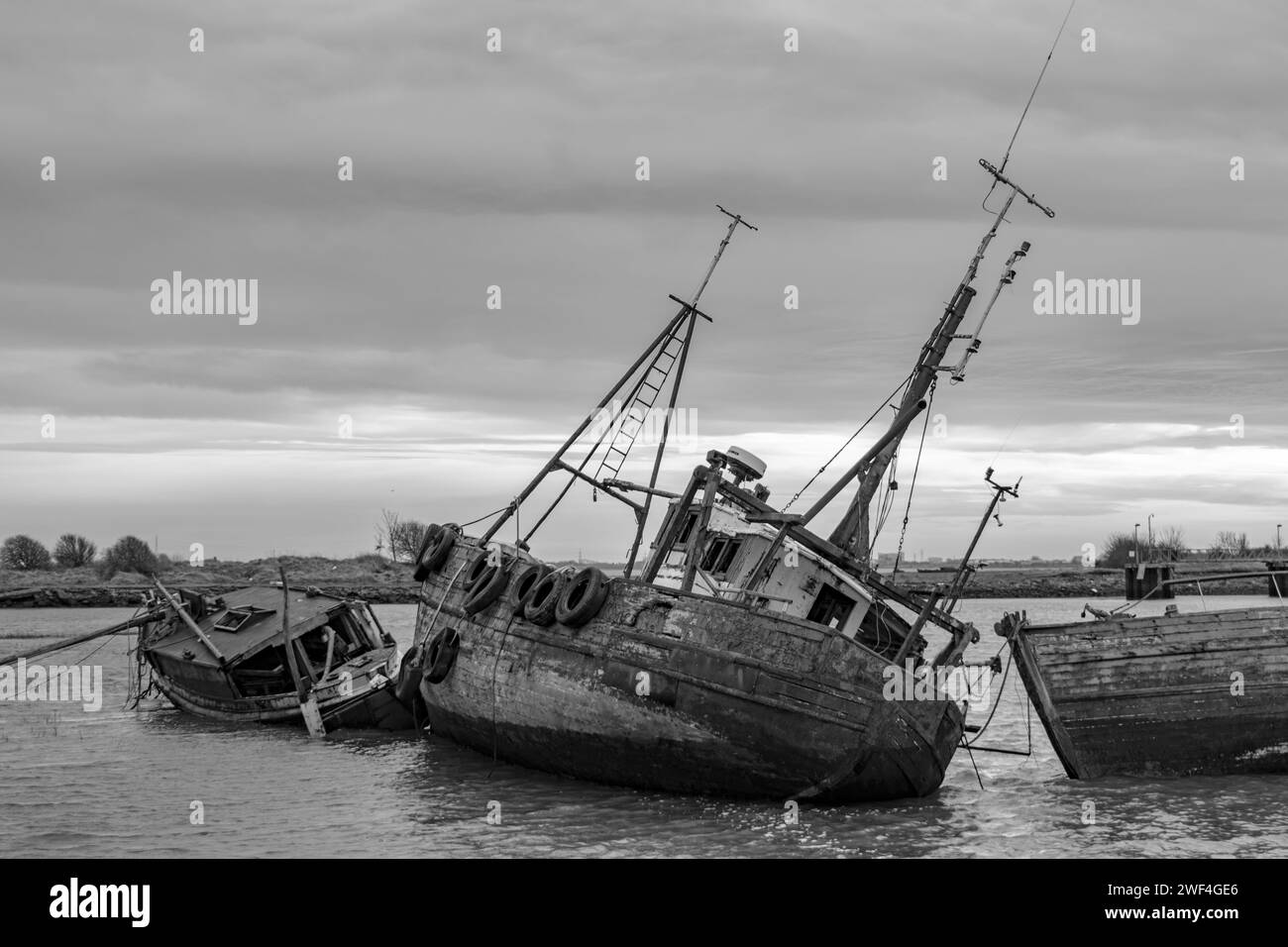 Derelict half sunken trawler boats in Fleetwood harbour, UK Stock Photo ...