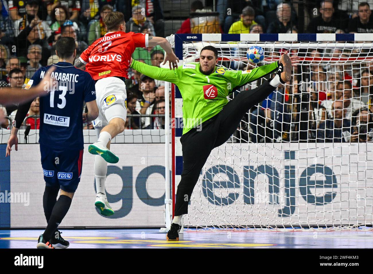 Cologne, Germany. 28th Jan, 2024. Samir Bellahcene (France) saves the ...