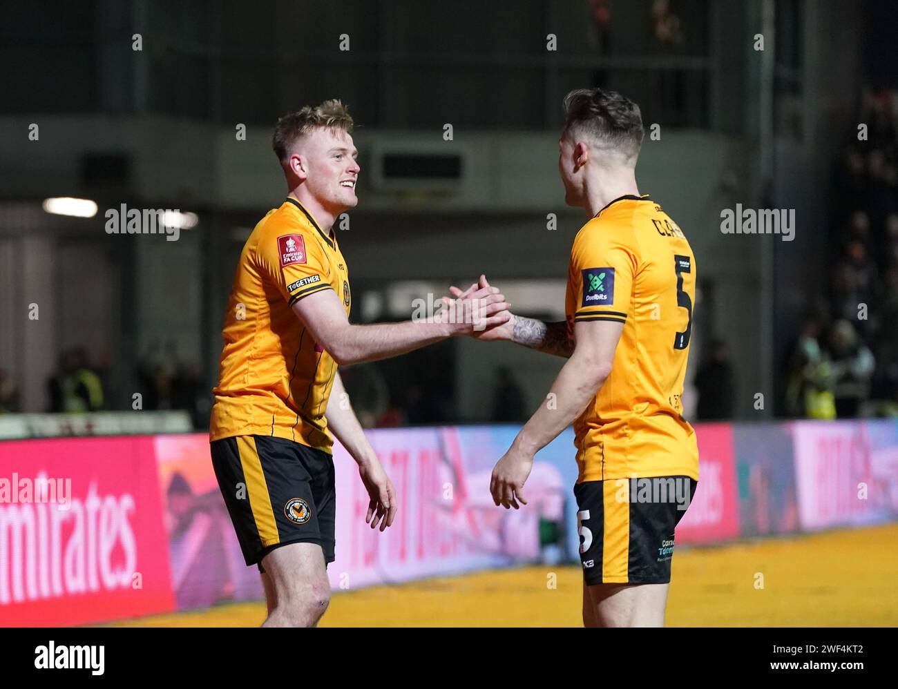 Newport County's Will Evans (left) celebrates scoring their side's ...