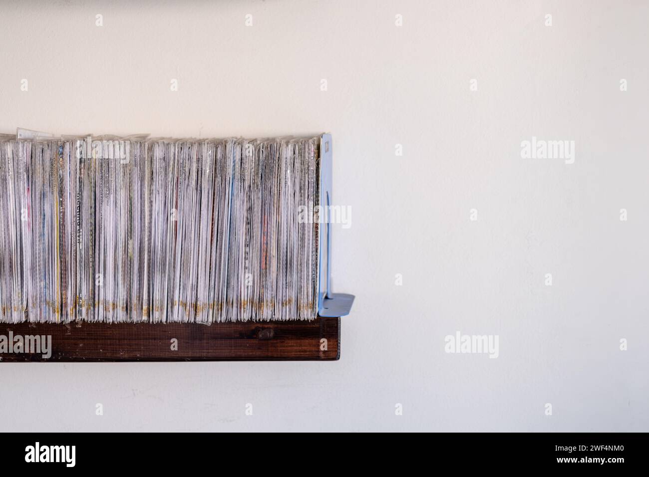 stack of files CD and books on shelf with white background Stock Photo ...