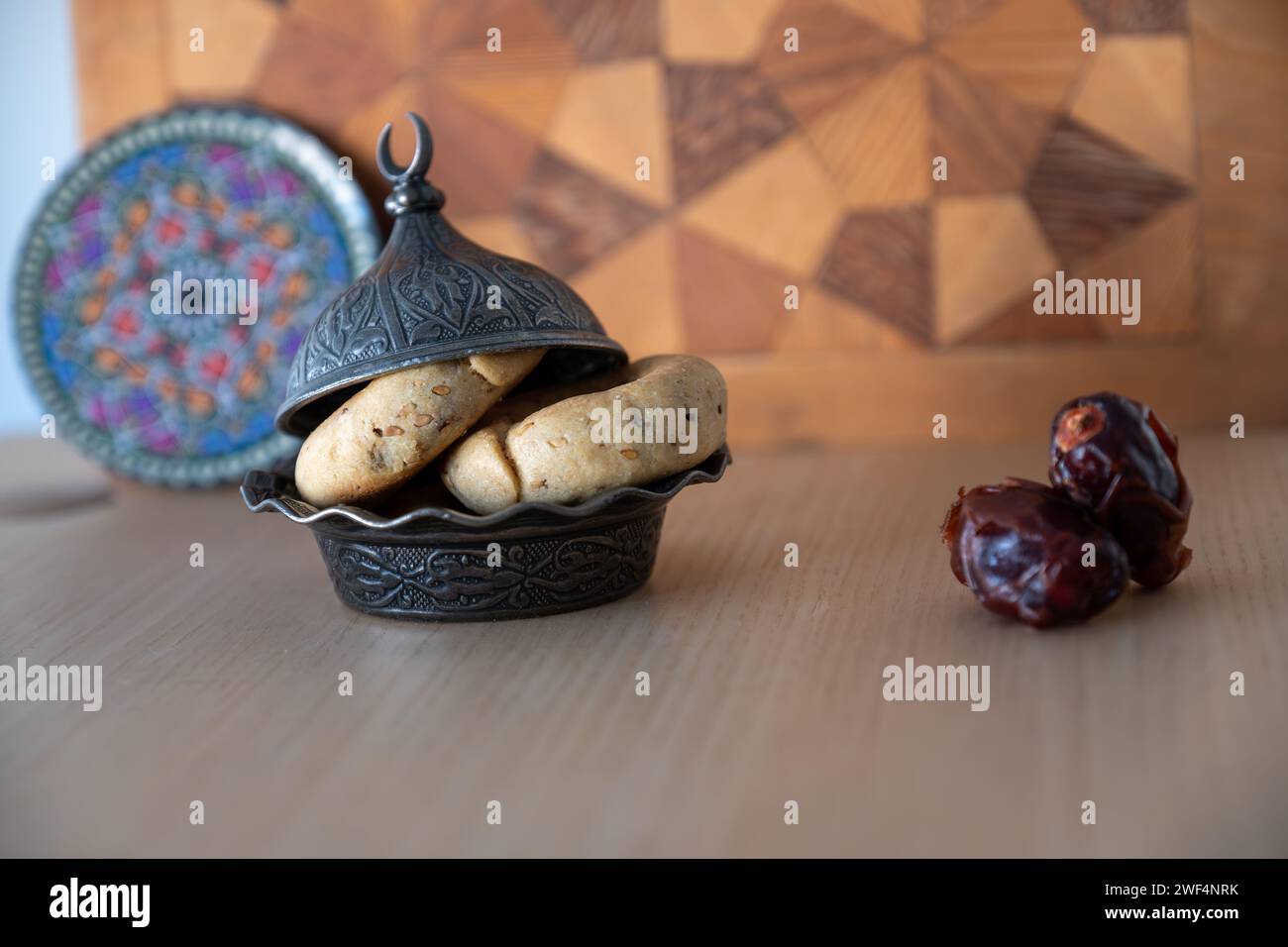 Arabic sweets with dates on arabesque background with arabian ...