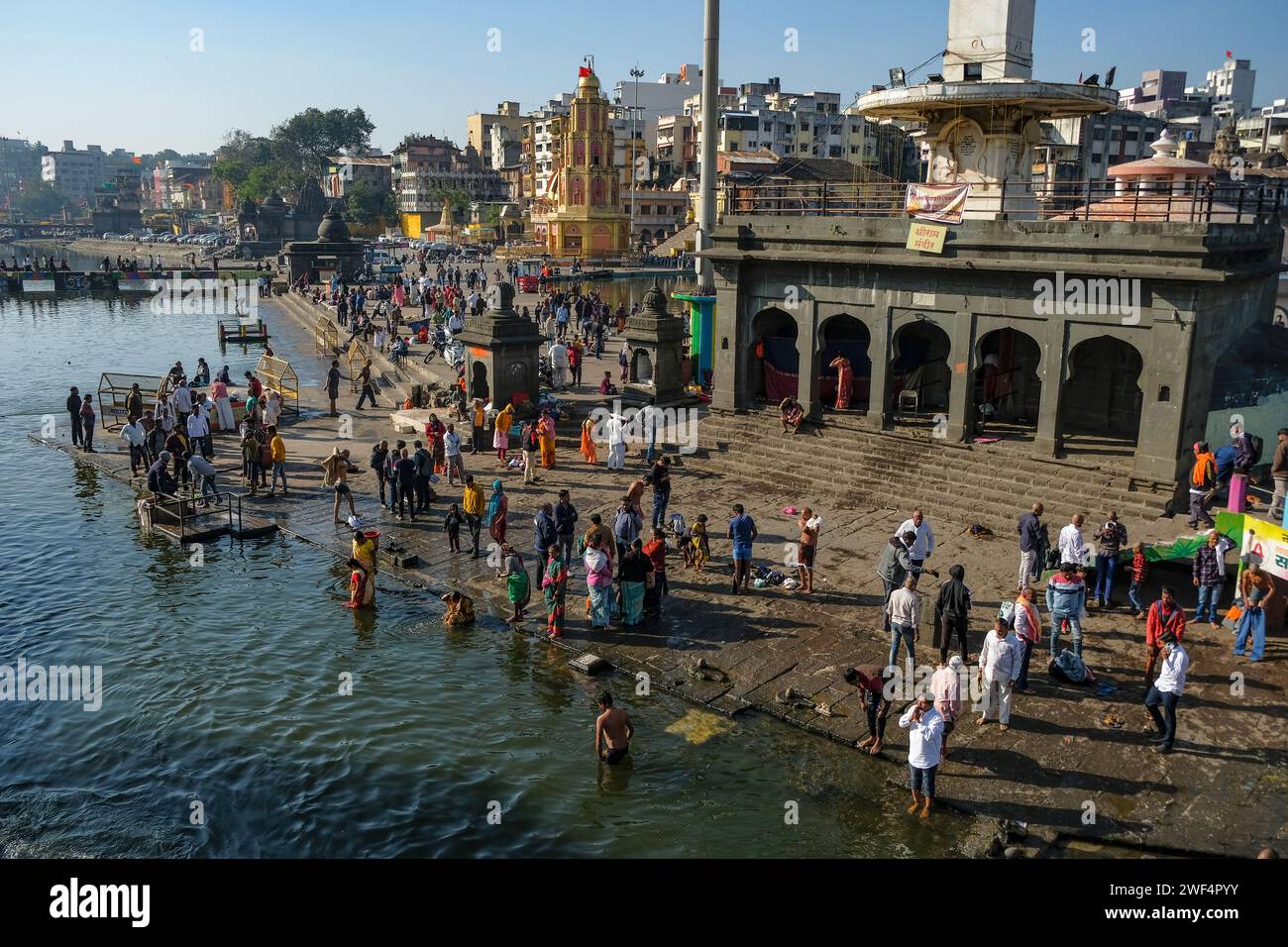 Nashik, India - January 25, 2024: People making offerings at the Ganga ...