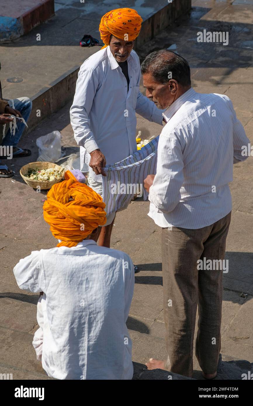 Nashik, India - January 25, 2024: Turbaned men visiting the Ganga Ghat ...