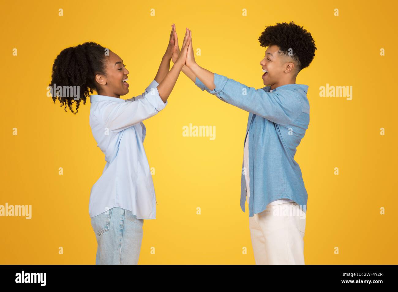 High fiving each other isolated hi-res stock photography and images - Alamy