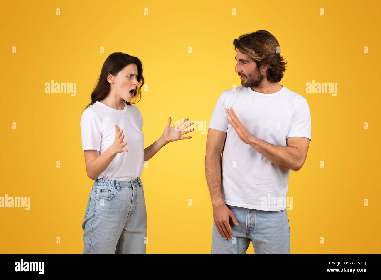 Animated conversation with a woman gesturing in surprise while talking ...