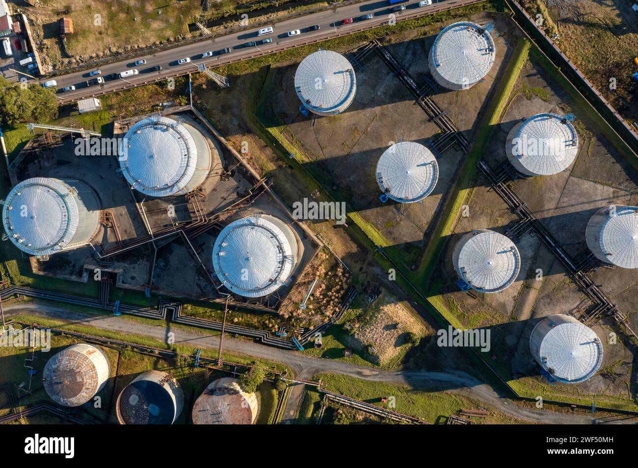 Aerial top down view of oil tanks at oil refinery. Gas and oil steel ...