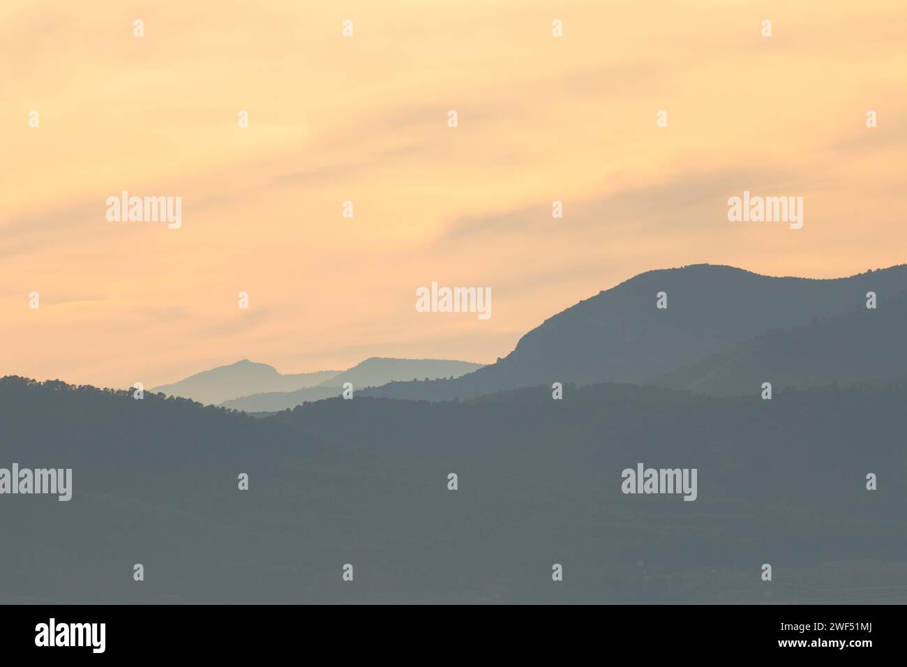 Zen sunset landscape with layers in the Onil mountains from the Sierra ...