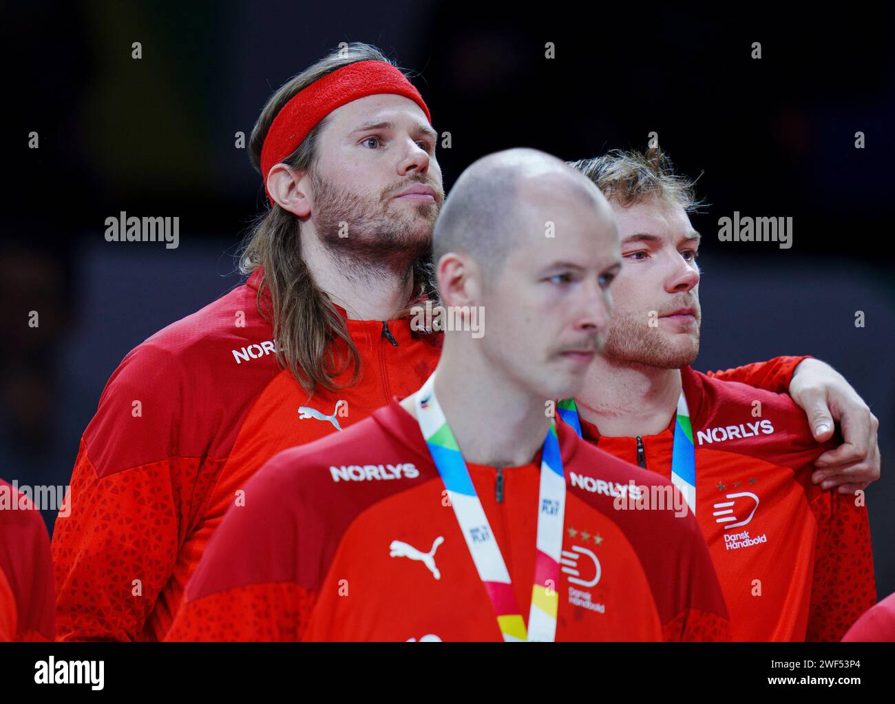 Mikkel Hansen, Mathias Gidsel and Simon Hald after the final between ...
