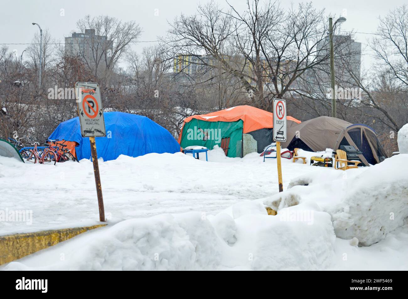 Homeless people live in makeshift tents alongside a River in Gatineau ...