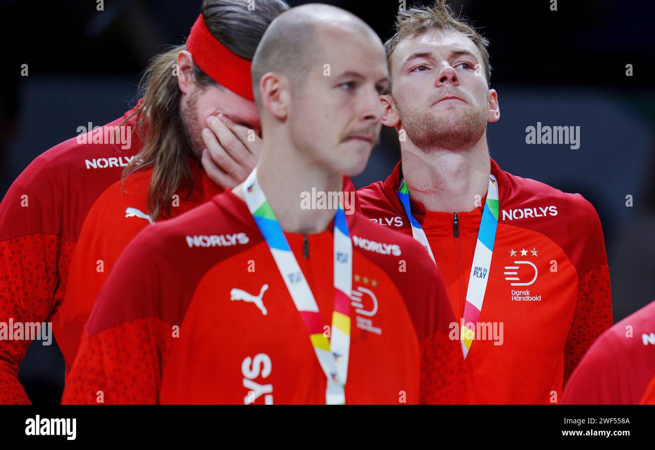 Mikkel Hansen, Mathias Gidsel and Simon Hald after the final between Denmark and France with the ...