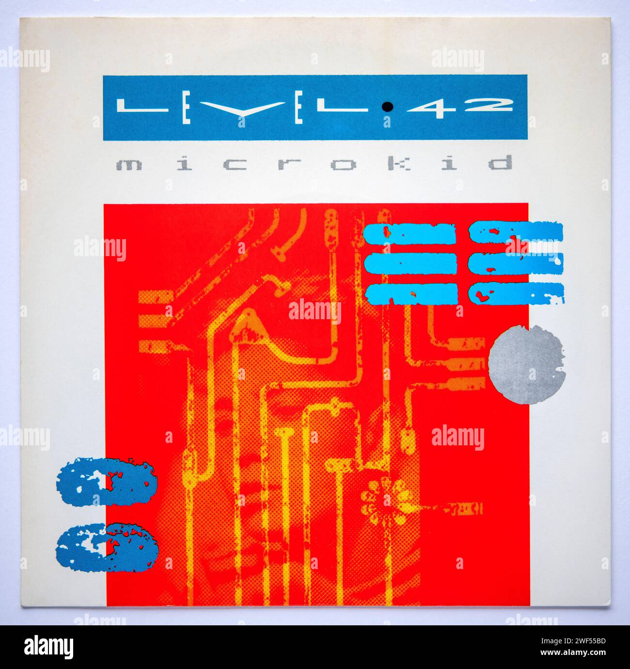 Picture cover of the seven inch single version of Micro Kid by Level 42 ...