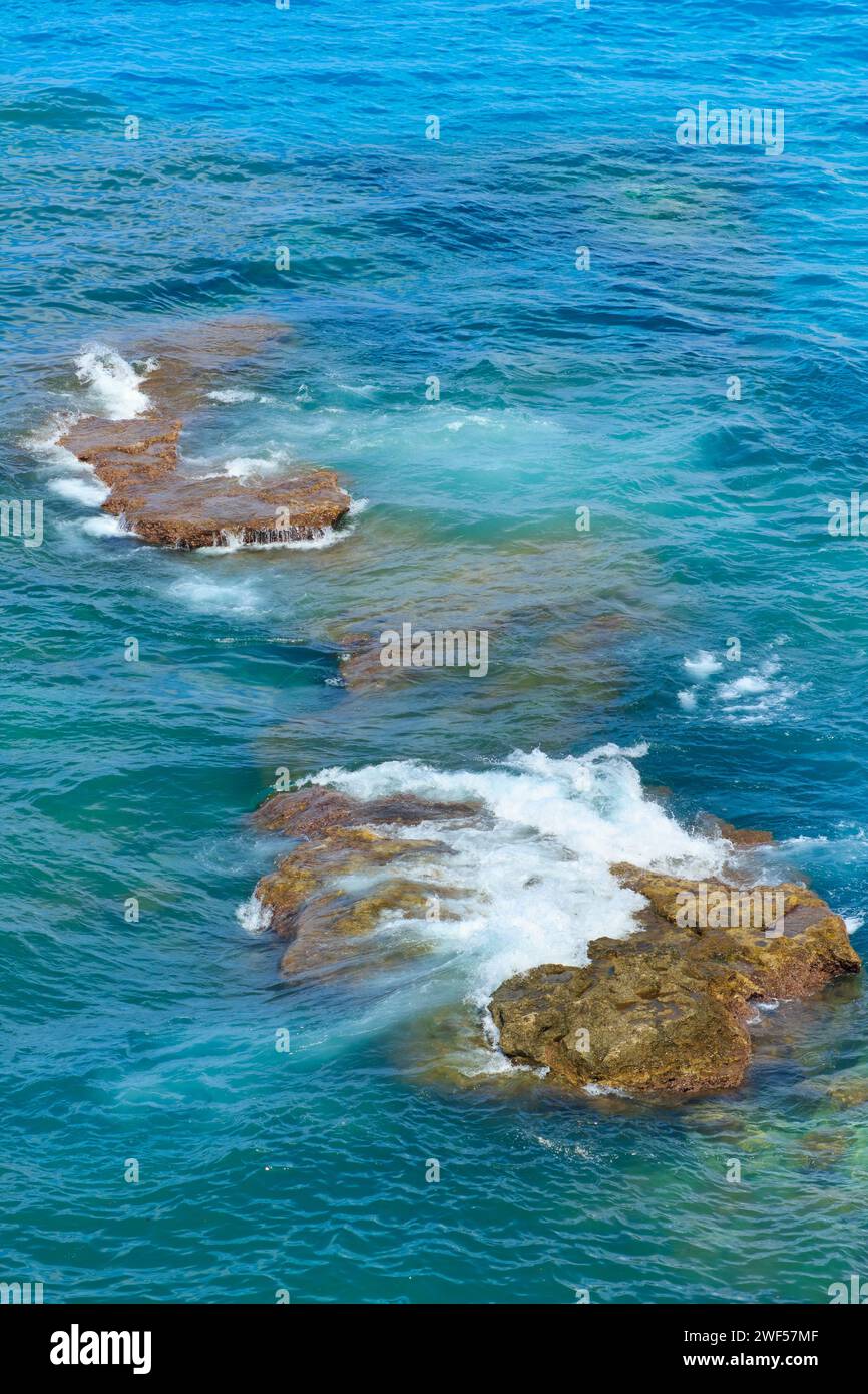 Sea waves hit beach island hi-res stock photography and images - Alamy