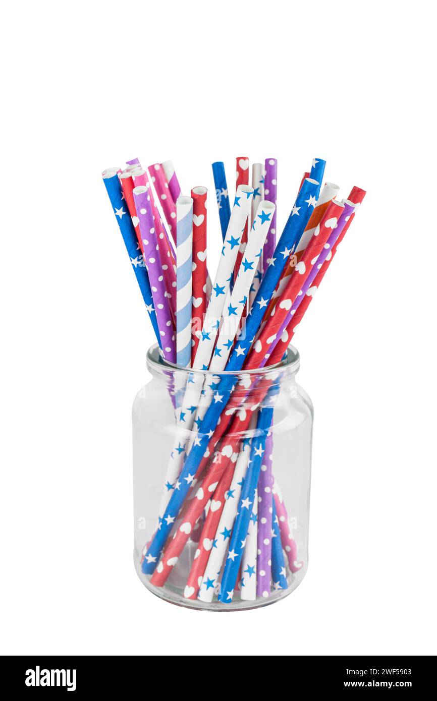 Colorful paper straws in a glass isolated on white background Stock ...